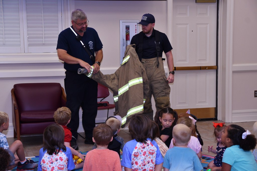 BPS firefighters read to children at library | The Post-Searchlight